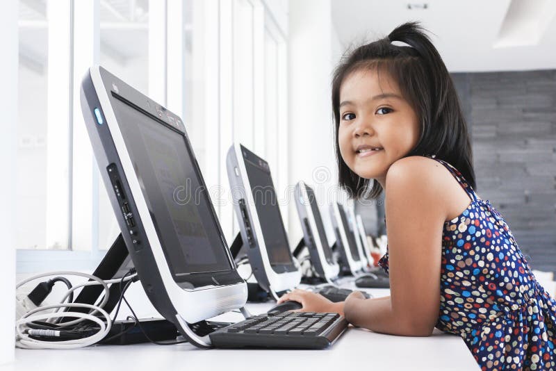 Little Girl Playing Computer Stock Image - Image of person, asian: 34784363