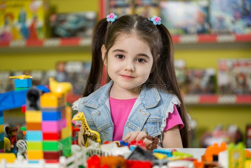 Little Girl Playing with Construction Blocks. Stock Image - Image of ...