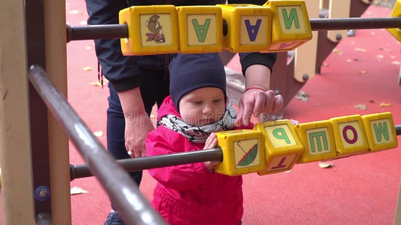 Little Girl Playing with Cubes on the Playground Stock Footage - Video ...