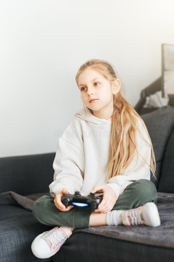Little Girl Playing on Games Console Stock Image - Image of girl, video ...