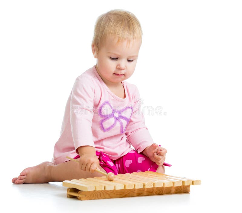Little Girl Playing with Musical Toy Stock Image - Image of performer ...