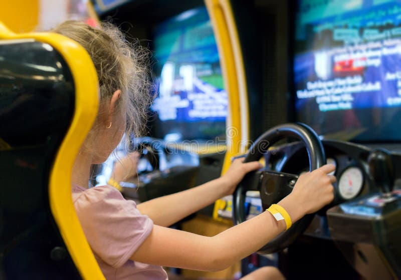 Little Girl Playing Racing Simulator. Stock Photo - Image of person ...