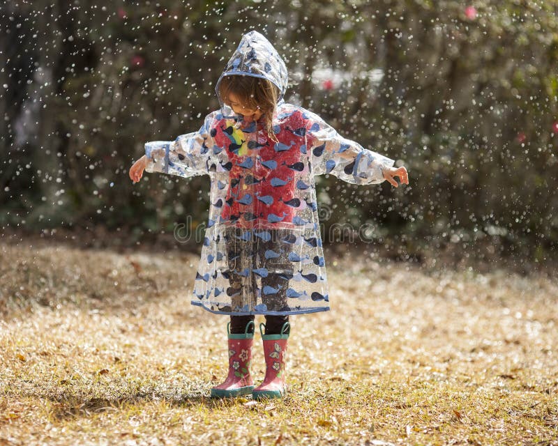 Little Girls with Umbrellas Stock Image - Image of playful, girls: 26275687