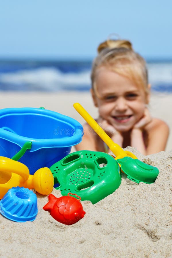 Little Girl Playing on the Sand Beach Stock Image - Image of blue ...