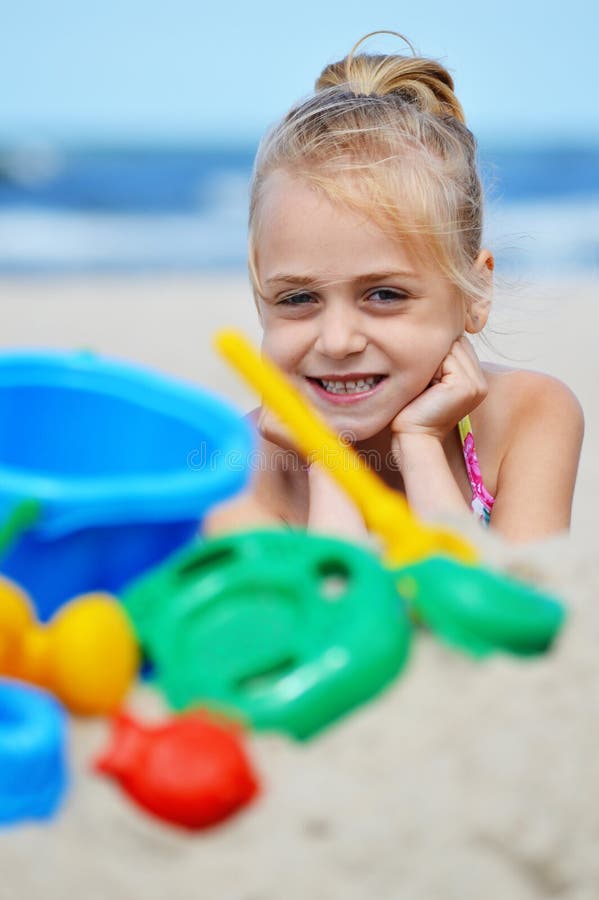 Little Girl Playing on the Sand Beach Stock Image - Image of little ...