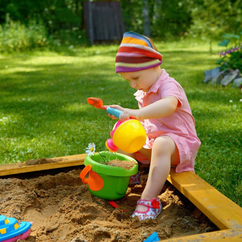 Child playing in sandbox stock photo. Image of relaxing - 2936956