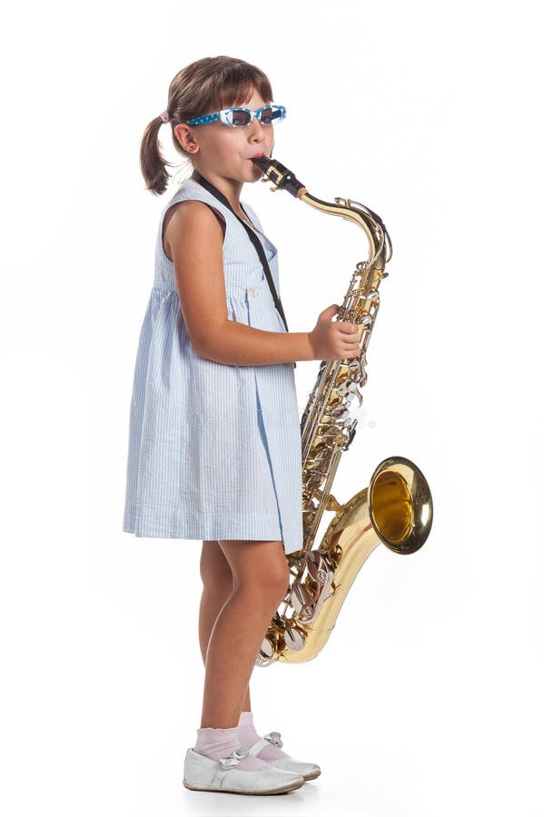 Little Girl Playing Saxophone Stock Image - Image of playful, player ...