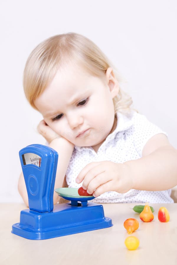Little Girl Playing with Scale Stock Image - Image of learning ...