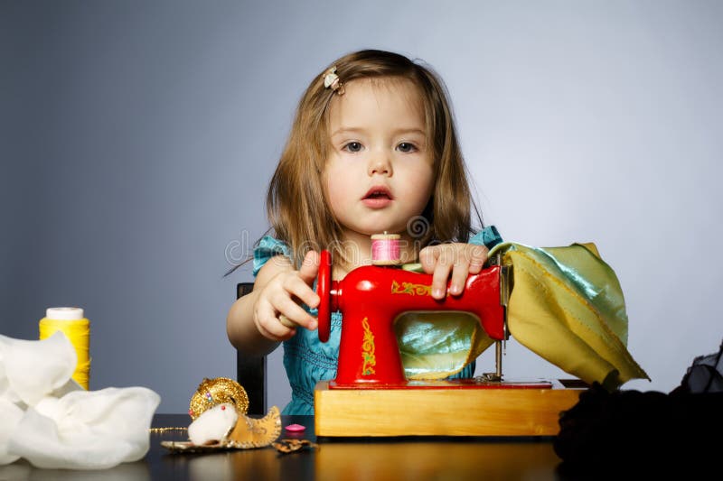 Little Girl is Playing with Sewing Machine Stock Photo - Image of baby ...