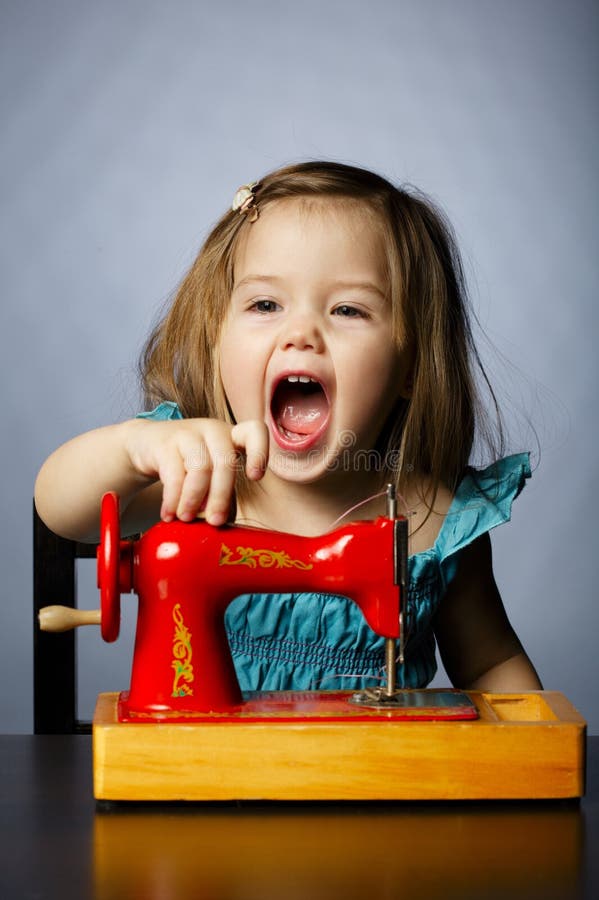 Little Girl is Playing with Sewing Machine Stock Image - Image of home ...