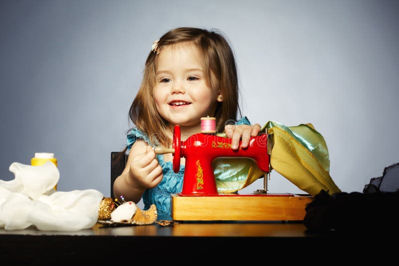 Little Girl is Playing with Sewing Machine Stock Photo - Image of cute ...