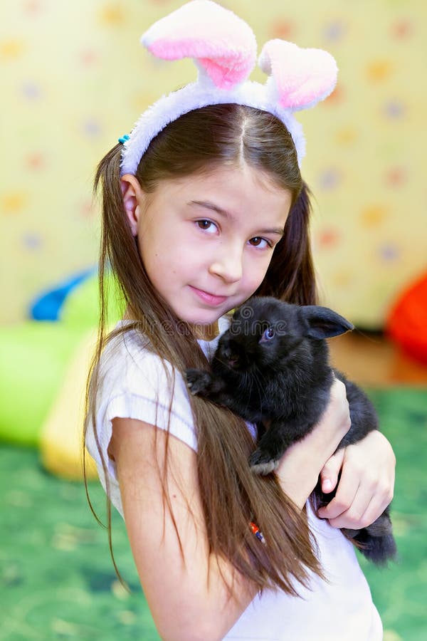 Little Girl Playing with a Small Rabbit Stock Image - Image of easter ...