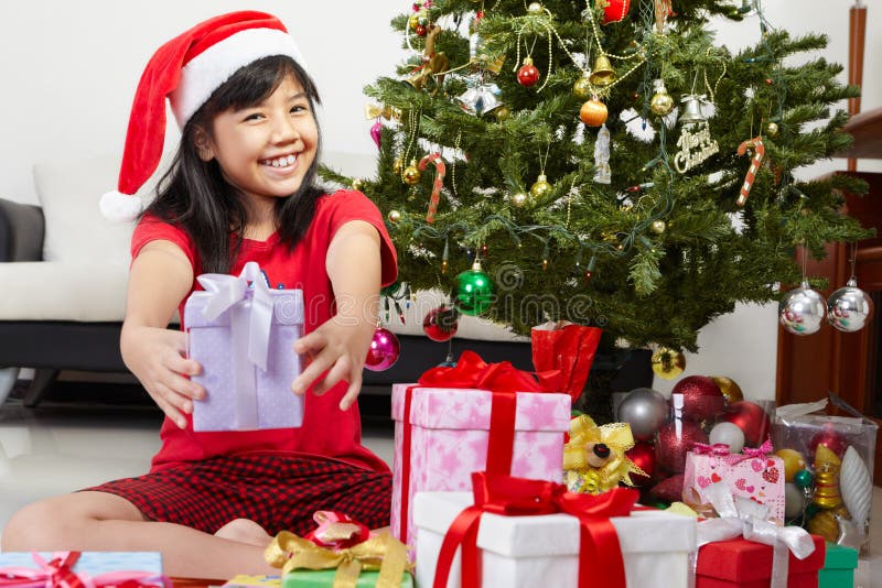 Little Girl Pointing Christmas Present Stock Image - Image of little ...