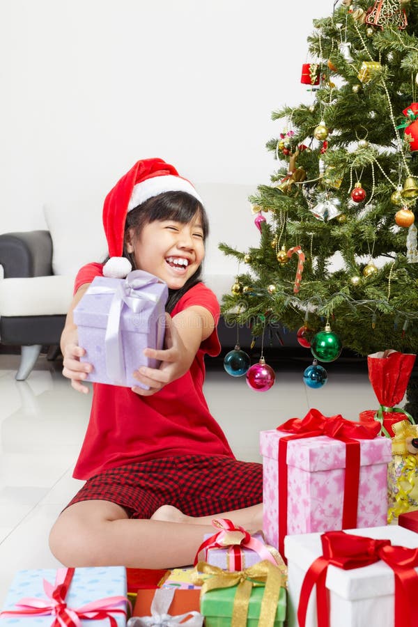Little Girl Pointing Christmas Present Stock Image - Image of present ...