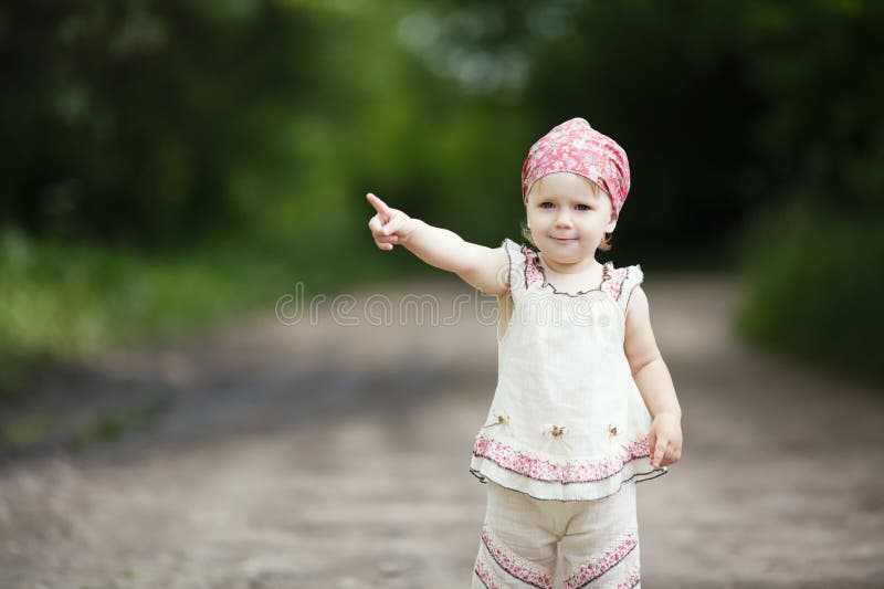 Little girl points up stock photo. Image of green, happiness - 39586884