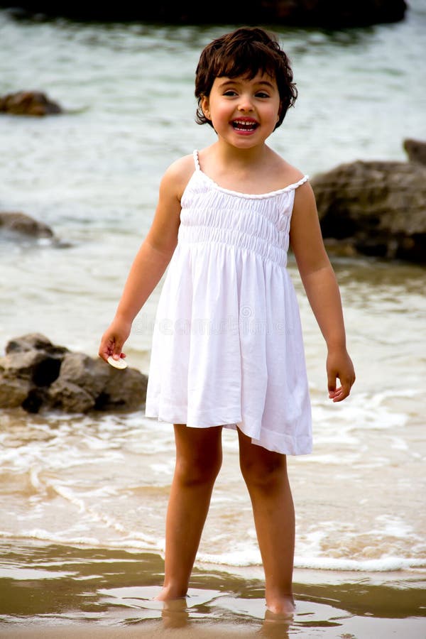Little girl portrait stock image. Image of leisure, sand - 32787139