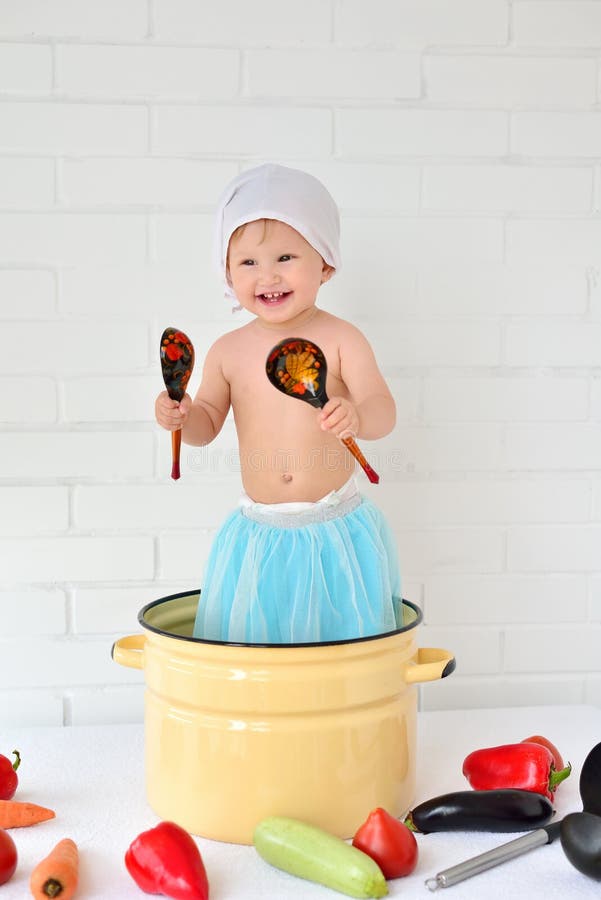 Little Girl in a Pot Cooking Dinner Stock Photo - Image of cook, girl ...
