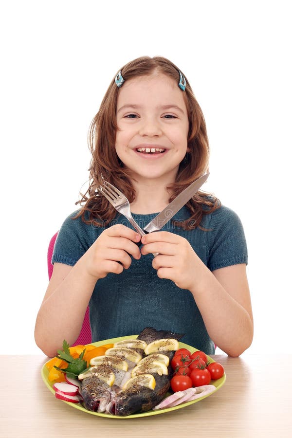 Little Girl with Prepared Fish on Table Stock Photo - Image of ...
