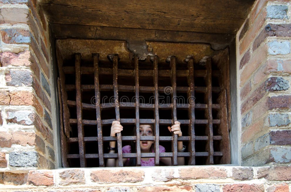 Little girl in prison stock photo. Image of prisoner - 20992748