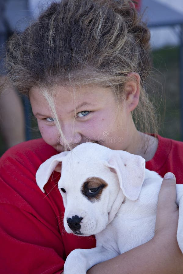 Little girl with puppy stock image. Image of child, beautiful - 12247519