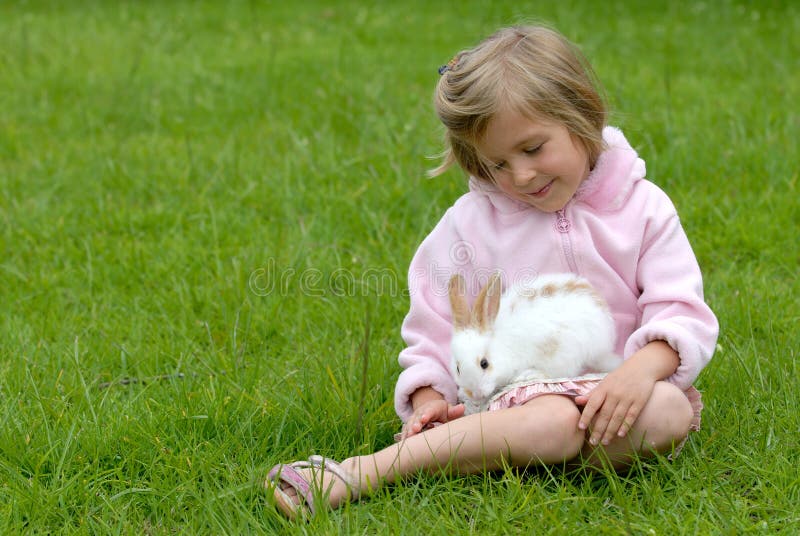 Little girl with a rabbit stock photo. Image of eyes, ears - 1768508