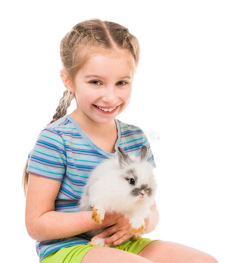 Little girl with a rabbit stock photo. Image of backdround - 53671236