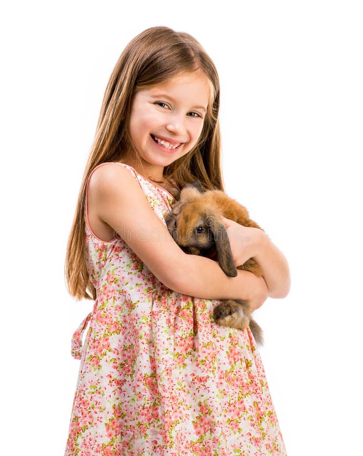 Little girl with a rabbit stock image. Image of girl - 53671307