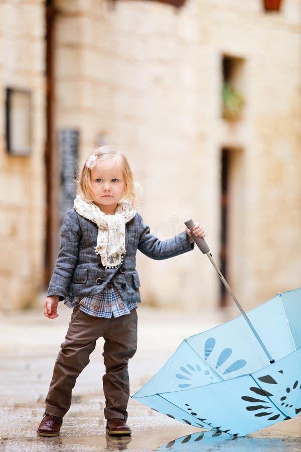 5,013 Little Girl Rainy Day Stock Photos - Free & Royalty-Free Stock ...