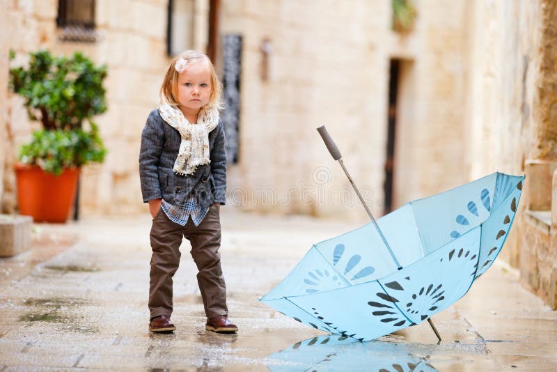 Little girl on rainy day stock image. Image of outdoor - 19493725