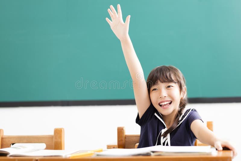 Little Girl Raised Hands in Classroom Stock Photo - Image of knowledge ...