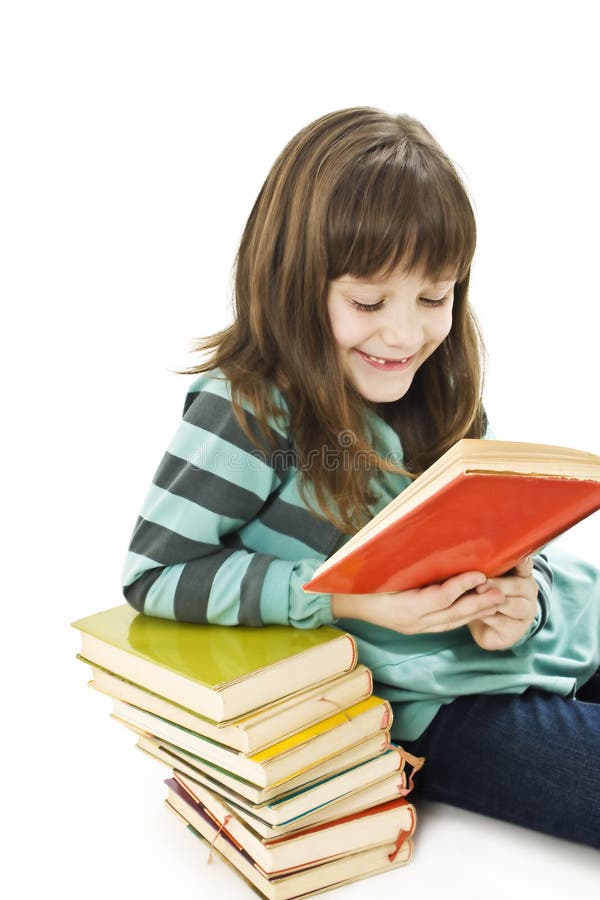 A Little Girl Reading A Book Stock Image - Image: 18155541