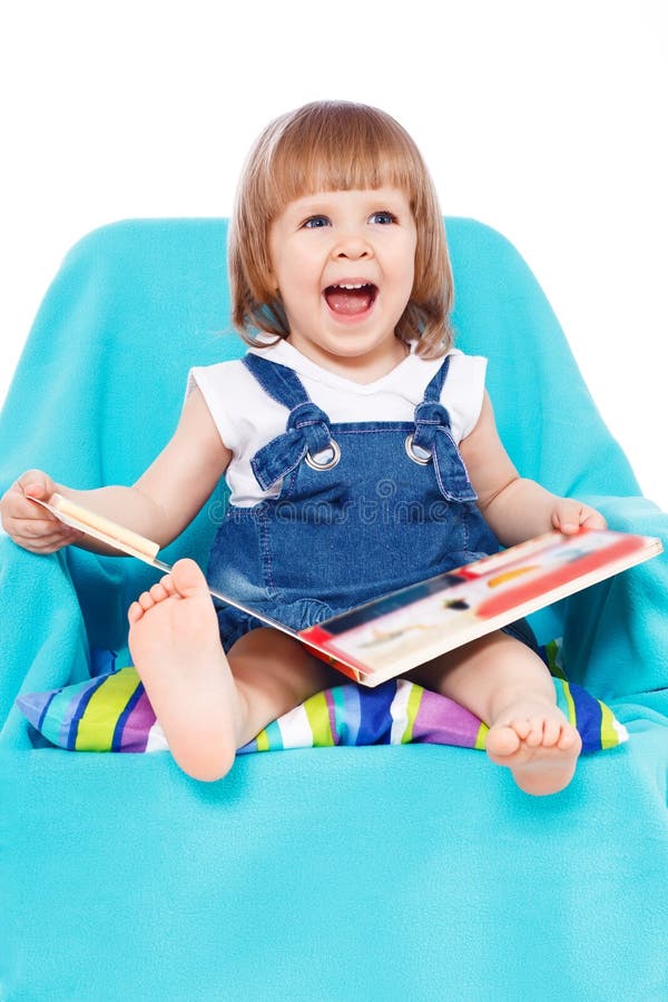 Little girl reading a book stock photo. Image of adorable - 19691540