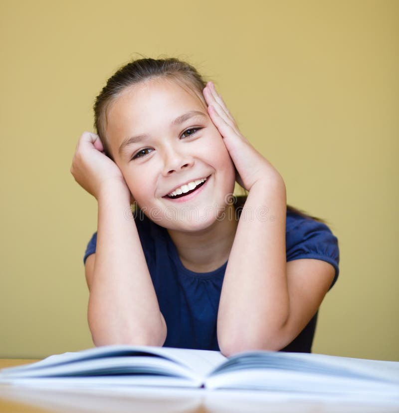 Little Girl is Reading a Book Stock Image - Image of bright, close ...