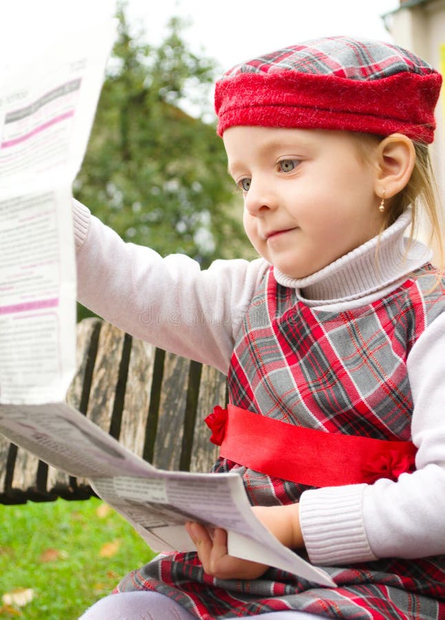 Baby Reading Newspaper