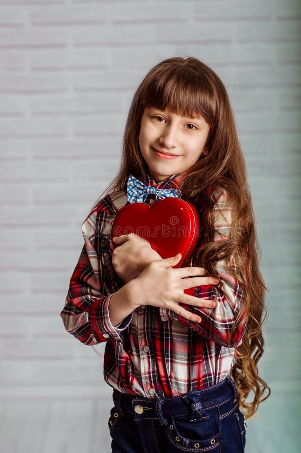 Little Girl with a Red Box of Chocolates Stock Photo - Image of dress ...