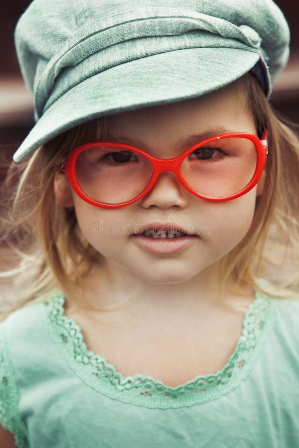 Little Girl in Red Glasses and a Cap Stock Image - Image of asian, face ...