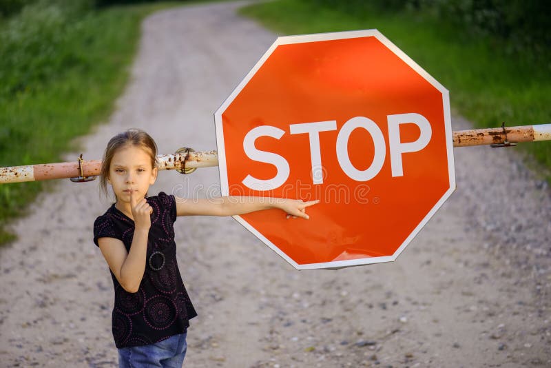 6,581 Girl Holding Stop Sign Stock Photos - Free & Royalty-Free Stock ...