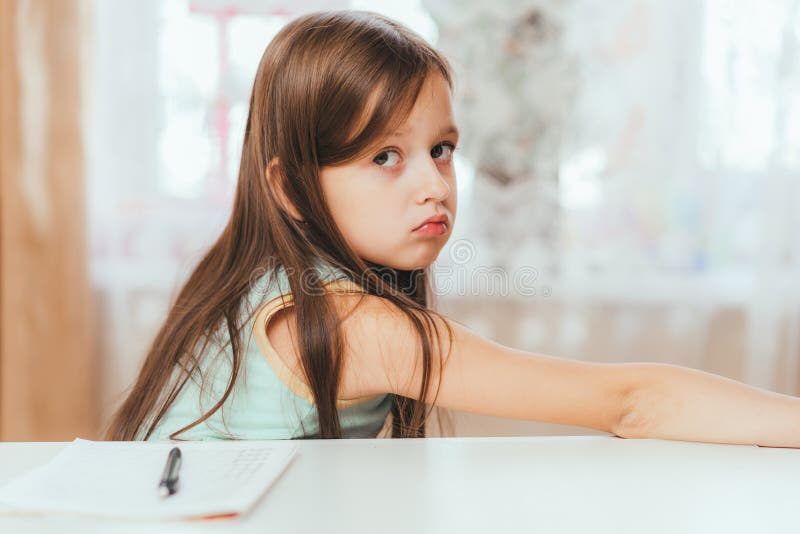 A Little Girl Refuses To Do Homework at Home Stock Photo - Image of ...