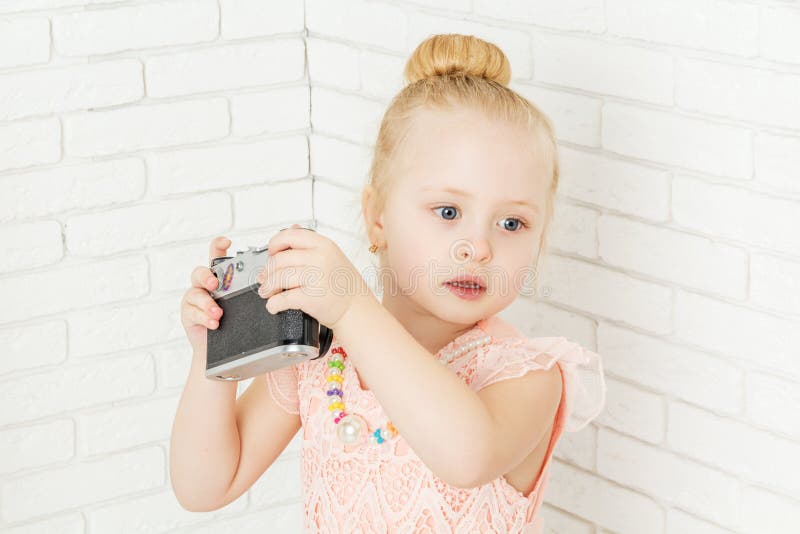 Little Girl with Retro Camera Stock Photo - Image of face, cute: 70005104
