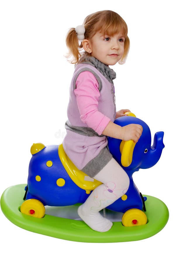 Little Girl Riding Elephant Toy Stock Photo - Image of elephant, people ...