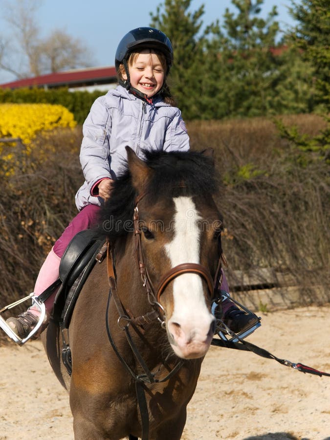 Little girl riding pony stock image. Image of practise - 25537741