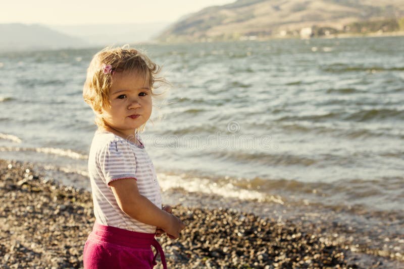 Little girl by river stock photo. Image of relax, cute - 38938200