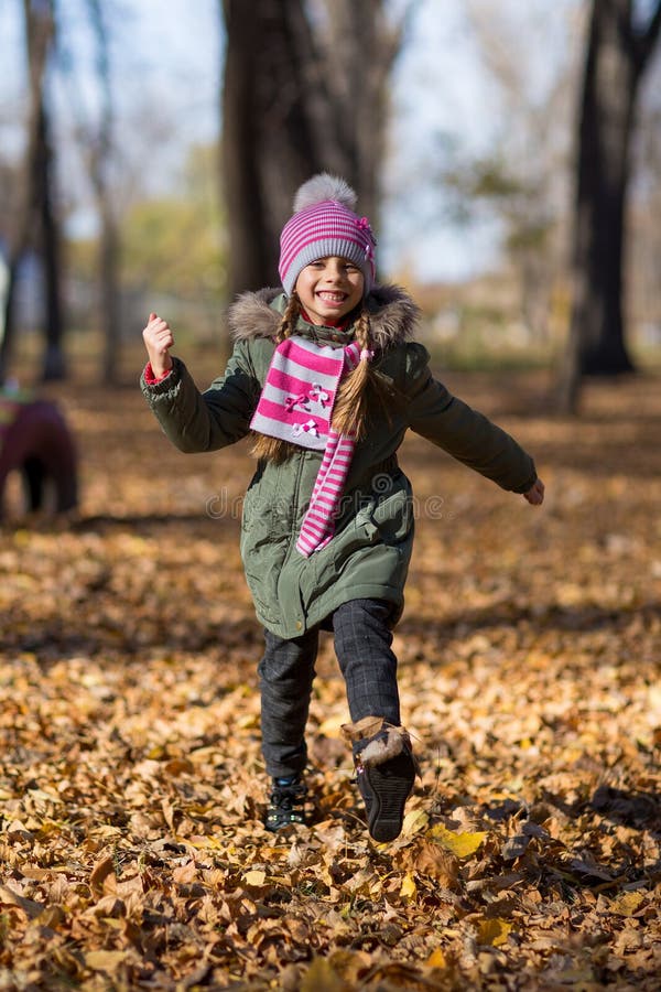 Little girl run in park. stock photo. Image of caucasian - 45880554