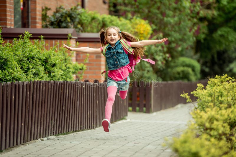Little Girl Run from School Stock Photo - Image of childhood, backpack ...