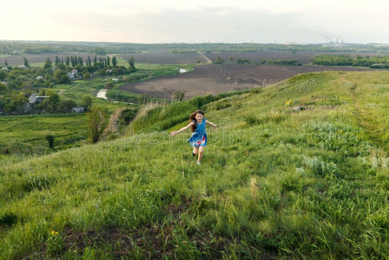 Little Girl Running on Meadow Stock Image - Image of field, green: 54538653