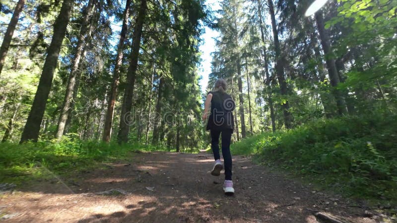 Little Girl Runs Along a Forest Path in Summer. Slow Motion Stock Video ...