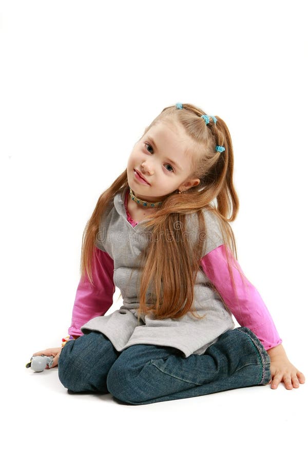 Little girl with sad smile stock image. Image of pink - 11763045