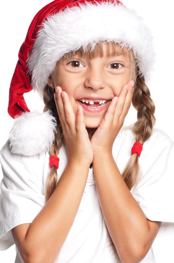 Little girl in Santa hat stock image. Image of holiday - 26714889