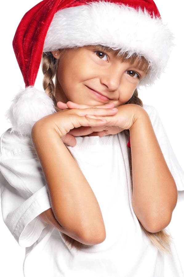 Cute Girl S Face and Eyes; Wearing Santa Hat Stock Photo - Image of ...