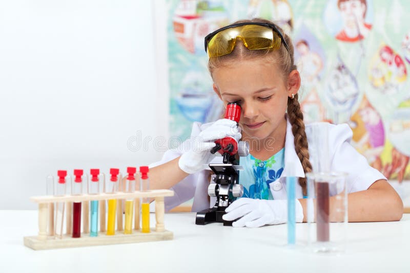 Little Girl in Science Class Using Microscope Stock Photo - Image of ...